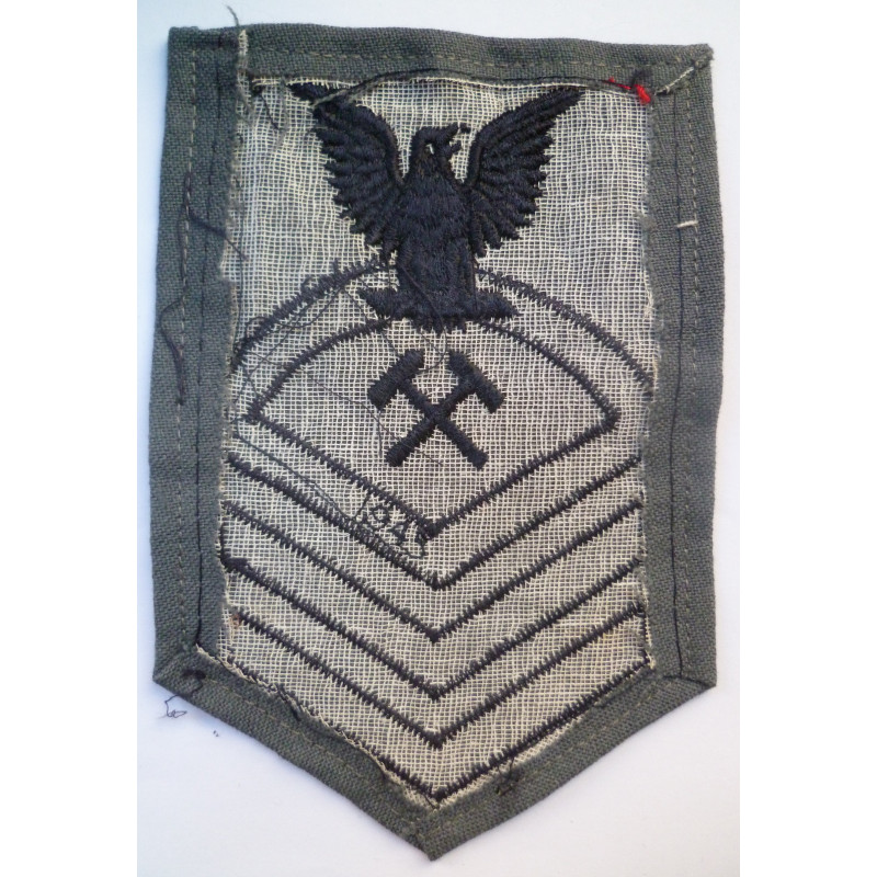 WW2 USN Chief Ship Fitter Grey Cloth Badge An original period badge.