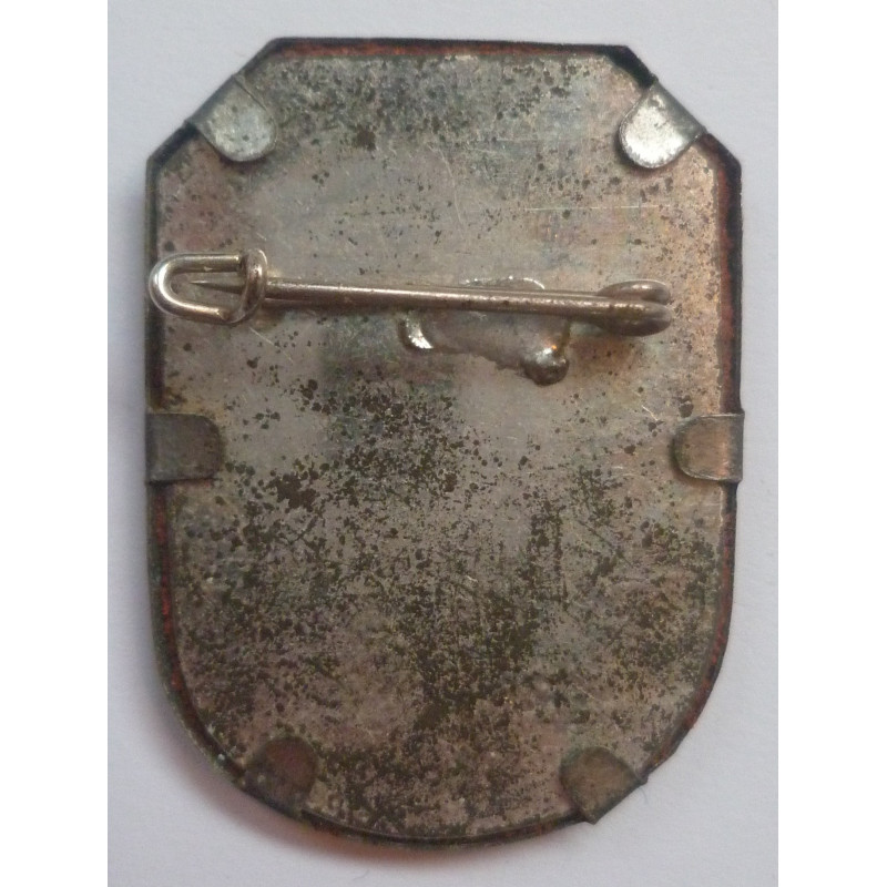 WWII German WHW Tinnie Badge A paper centre and metal surround. UK.