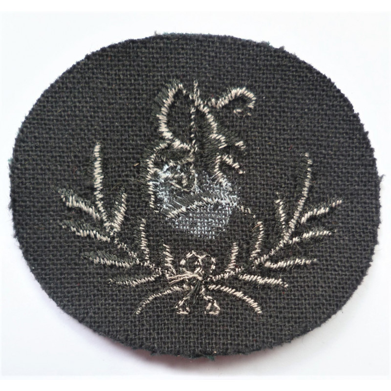Rifle Brigade B Cloth Trade Badge Black on dark green cloth insignia